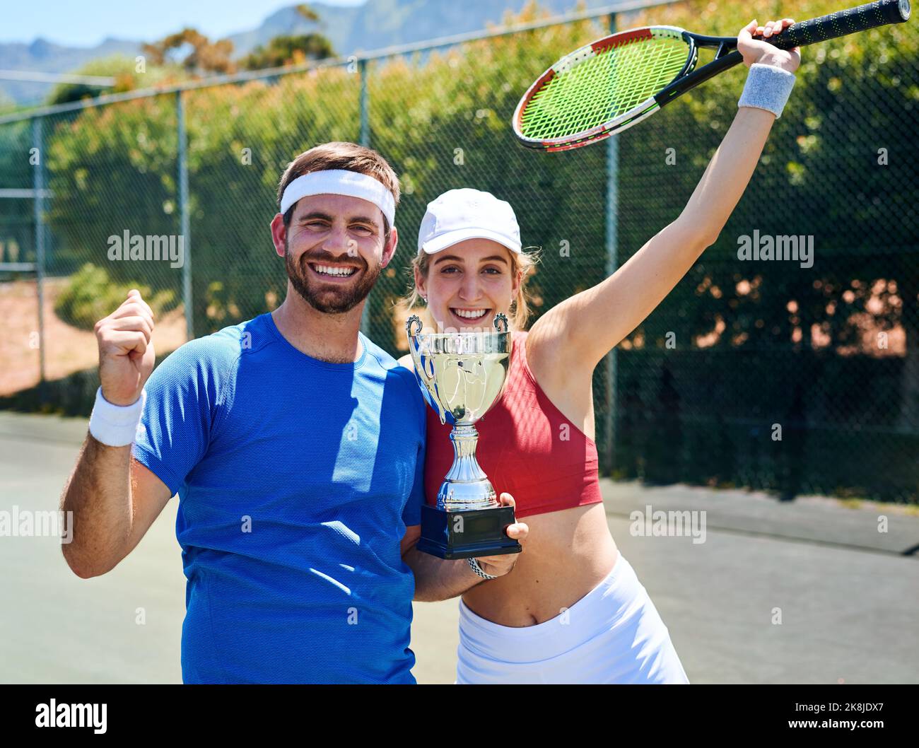 Another trophy for our mantelpiece. Cropped portrait of two young ...