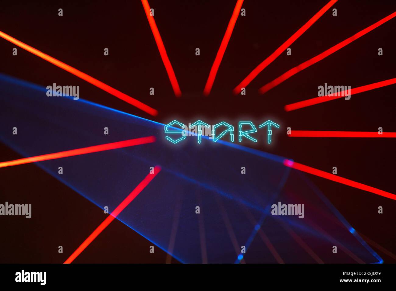 Dark background with red laser beams and text Start. Background for ...