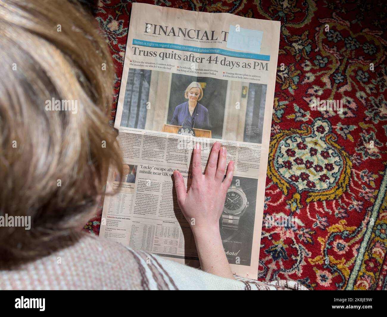 LONDON, ENGLAND - OCTOBER 20: Directly above view woman reading in ...
