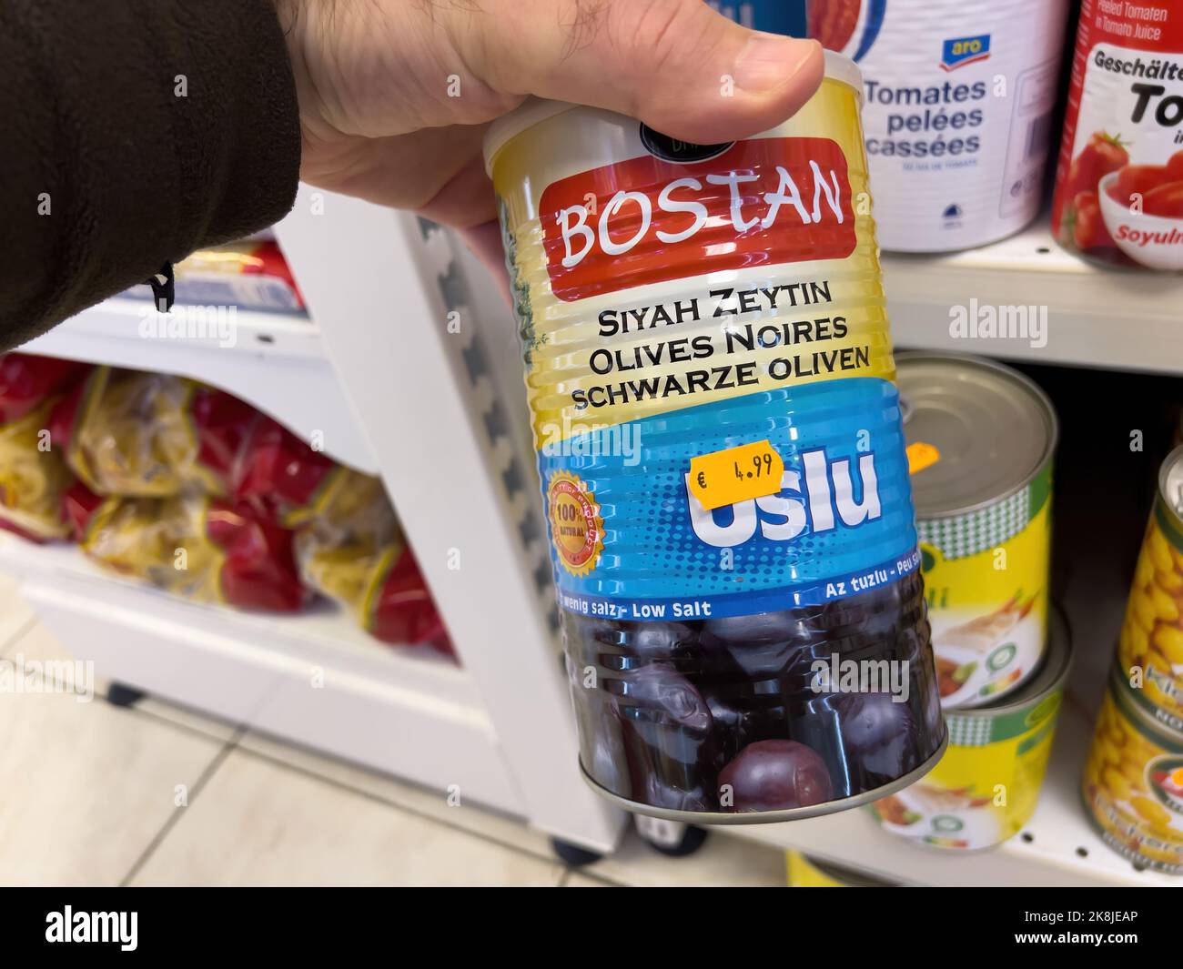 Paris, France - Oct 21, 2022: POV male hand holding buying shopping ...
