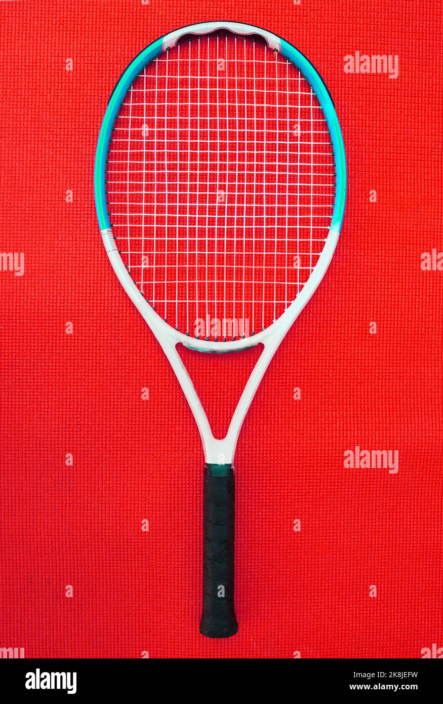 My weapon of choice. High angle shot of a single tennis racket placed ...