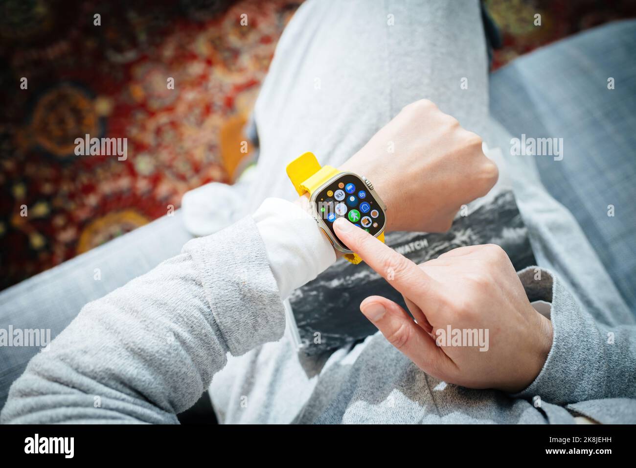 London, United Kingdom - Sep 28, 2022: POV woman hand choosing app on ...