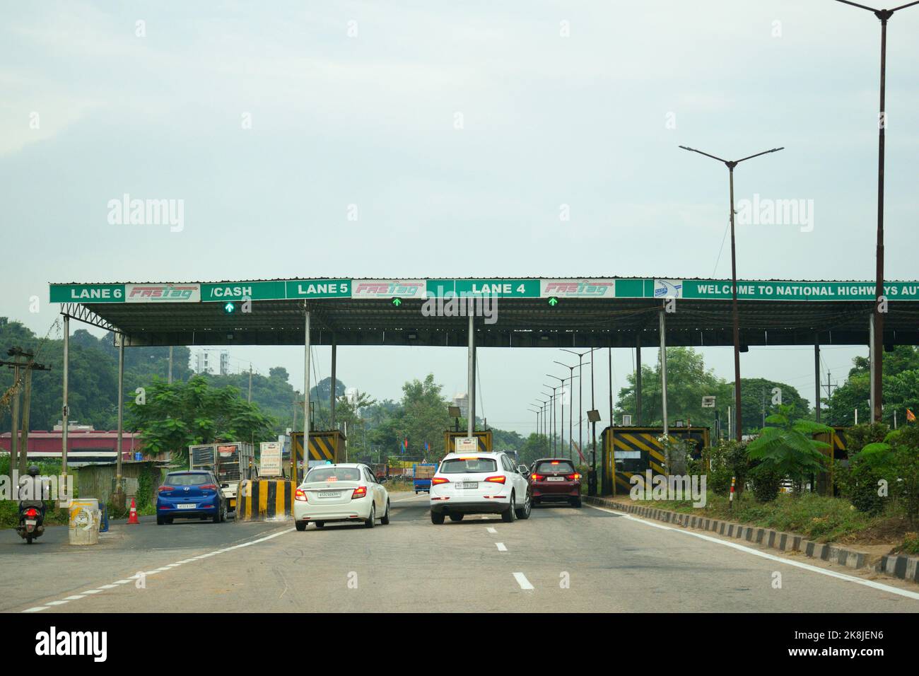 Vehicle passing through Nazirakahat (Sonapur) toll gate towards upper ...