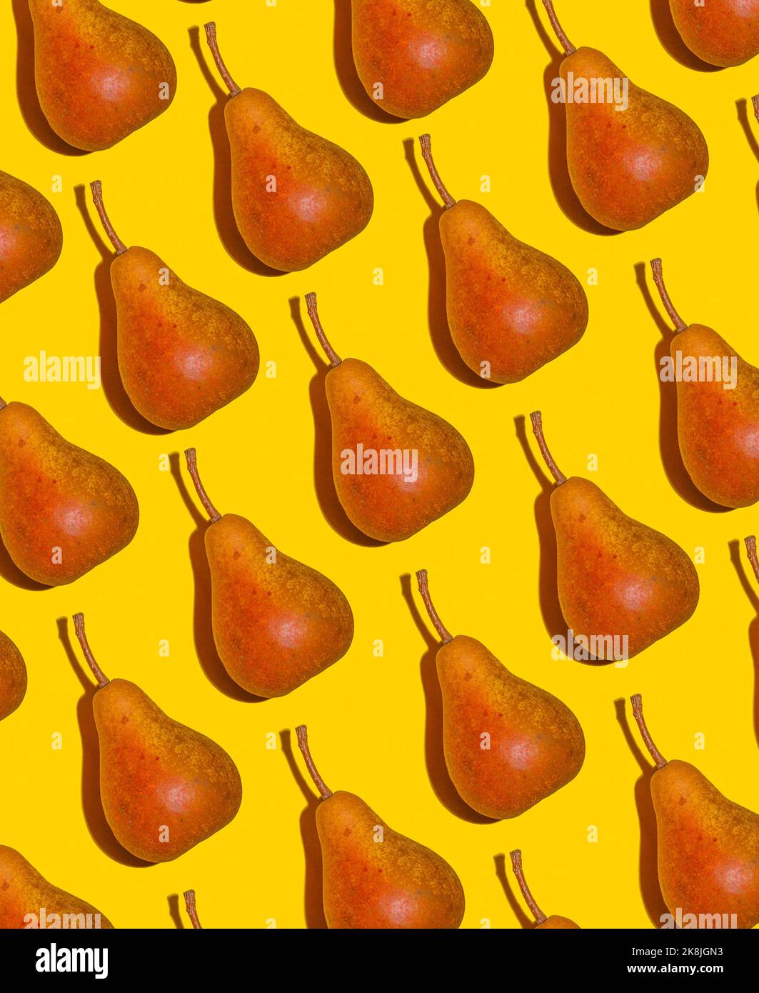 Colorful pear pattern. Orange Bera pears on a yellow background. Ripe ...