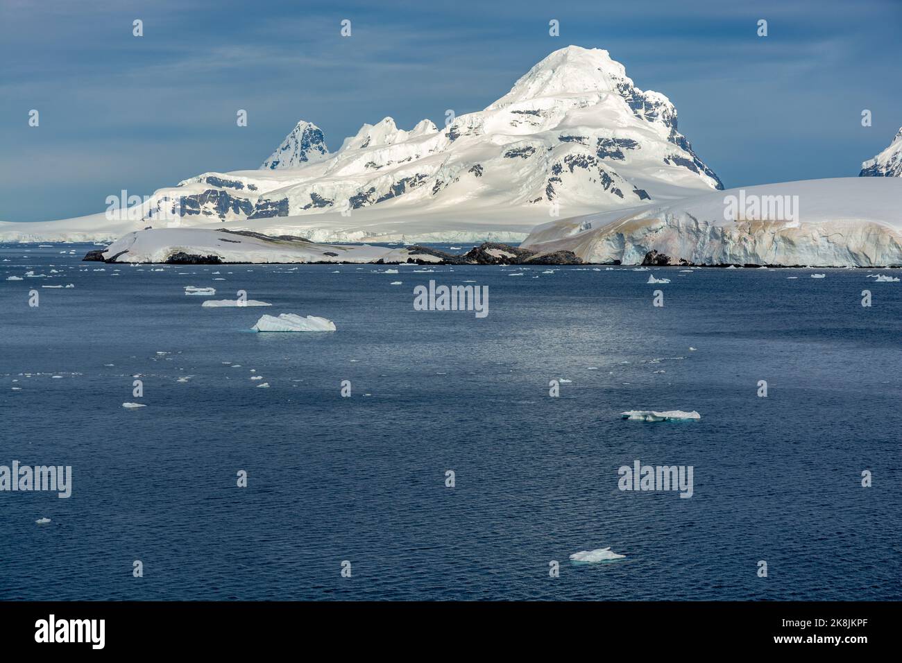 lautaro island in front of peaks on wiencke island from bryde channel ...