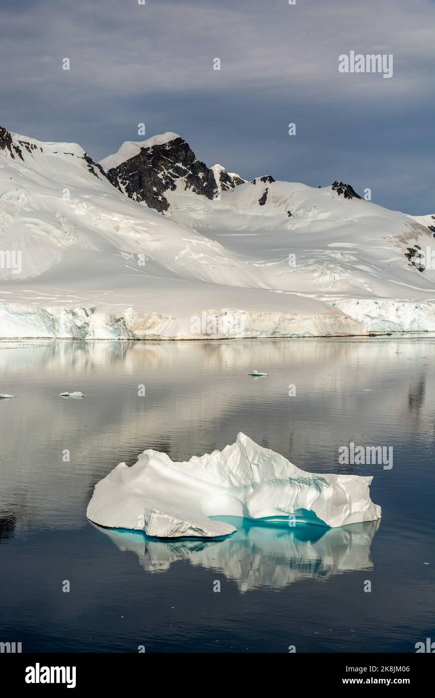 iceberg in still waters of paradise harbour (bay) opposite bryde island ...