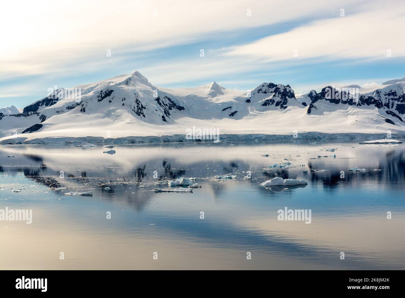 still waters of paradise harbour (bay) with mt. hoegh (l). danco coast ...