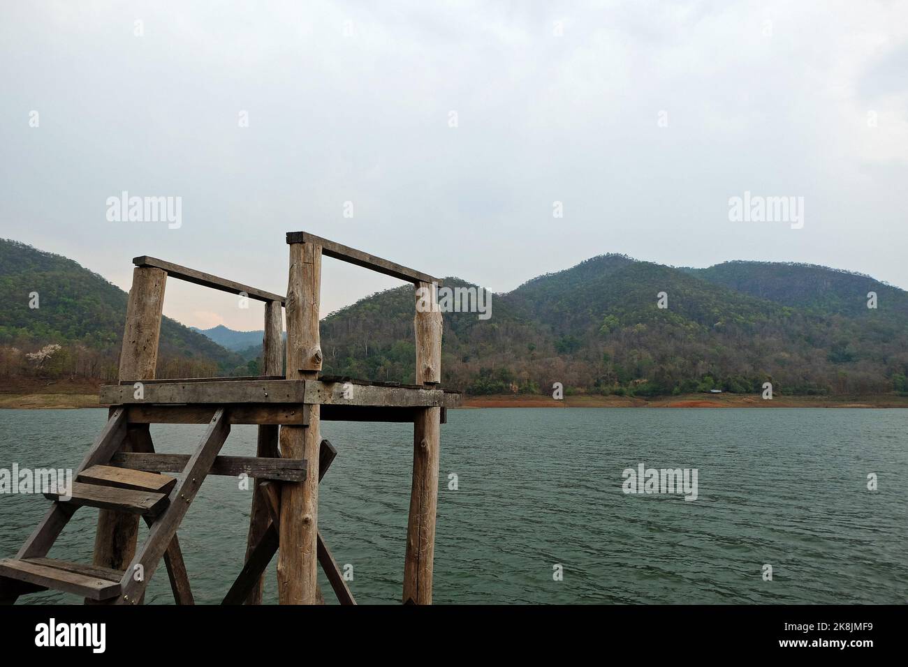Wooden Jumping ladder with natural landscape of lake and mountain view ...