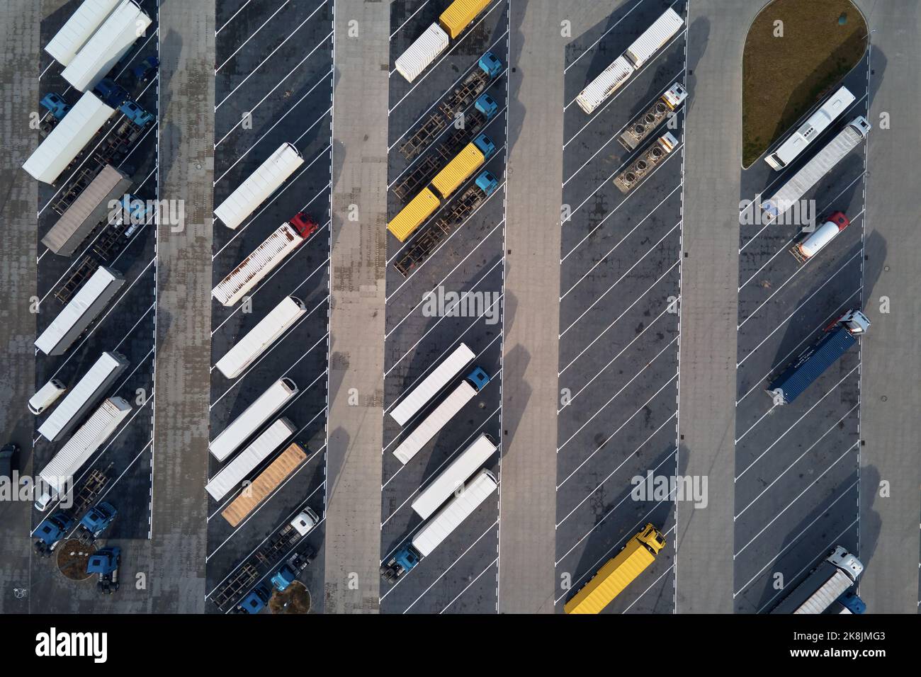 Top view of semi trucks waiting for loading at parking lot at logistic ...