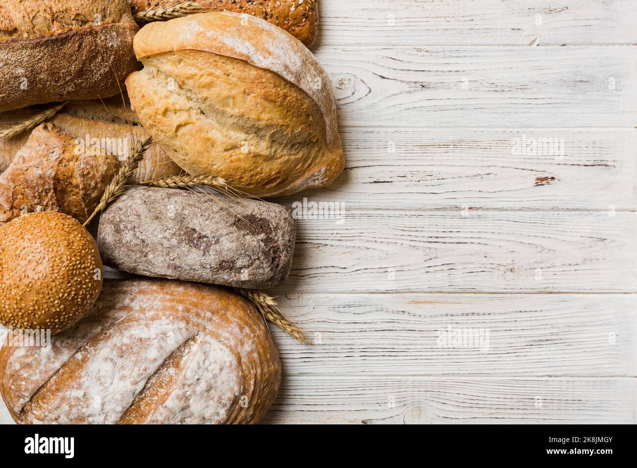 Homemade natural breads. Different kinds of fresh bread as background ...