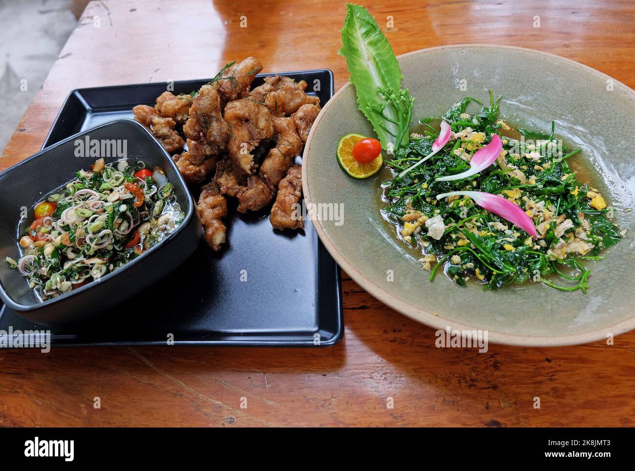Battered and deep fried fish with herb sauce, Stir fry Malindjo leaves ...