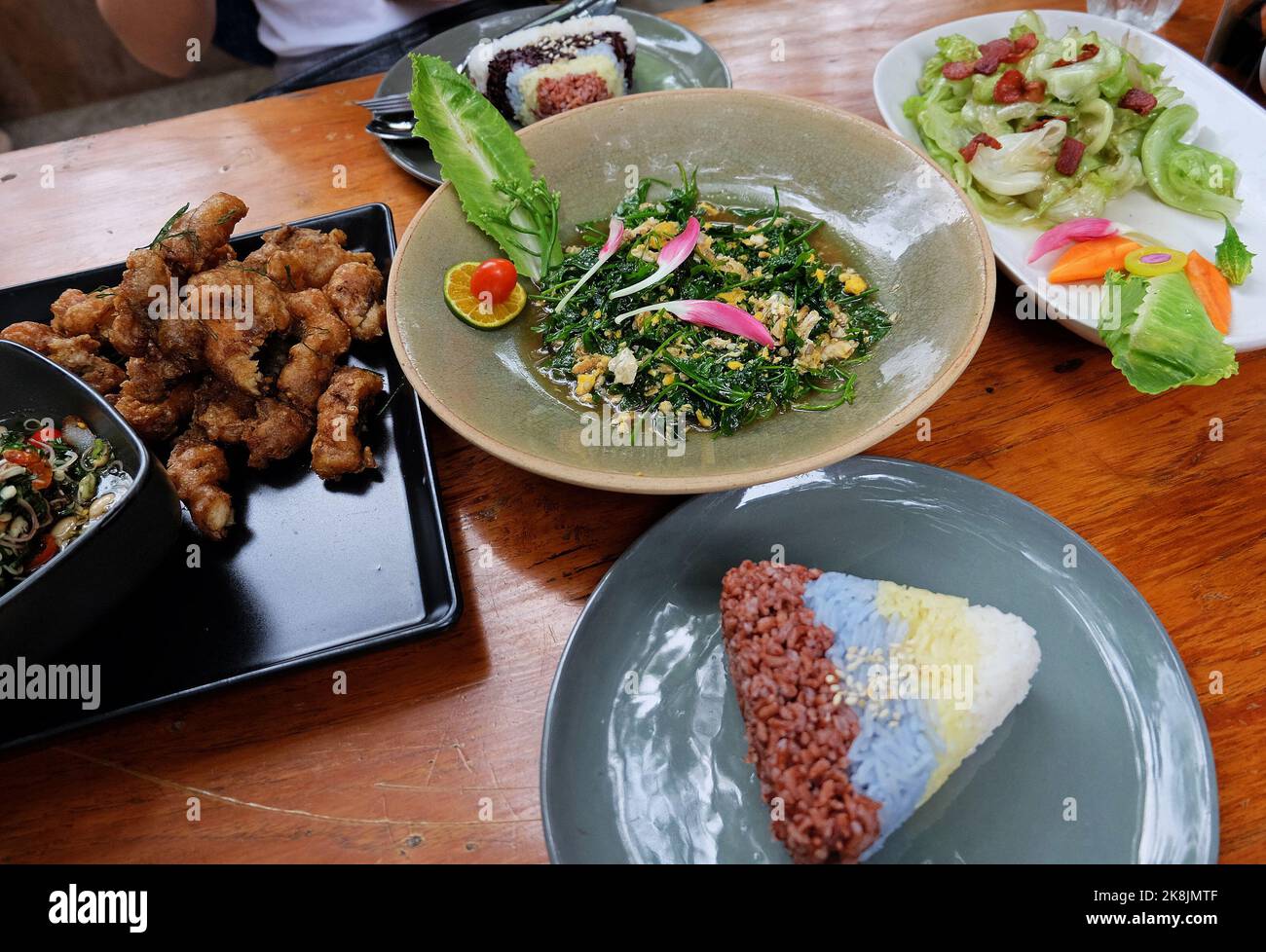 Battered and deep fried fish with herb sauce, Stir fry Malindjo leaves ...
