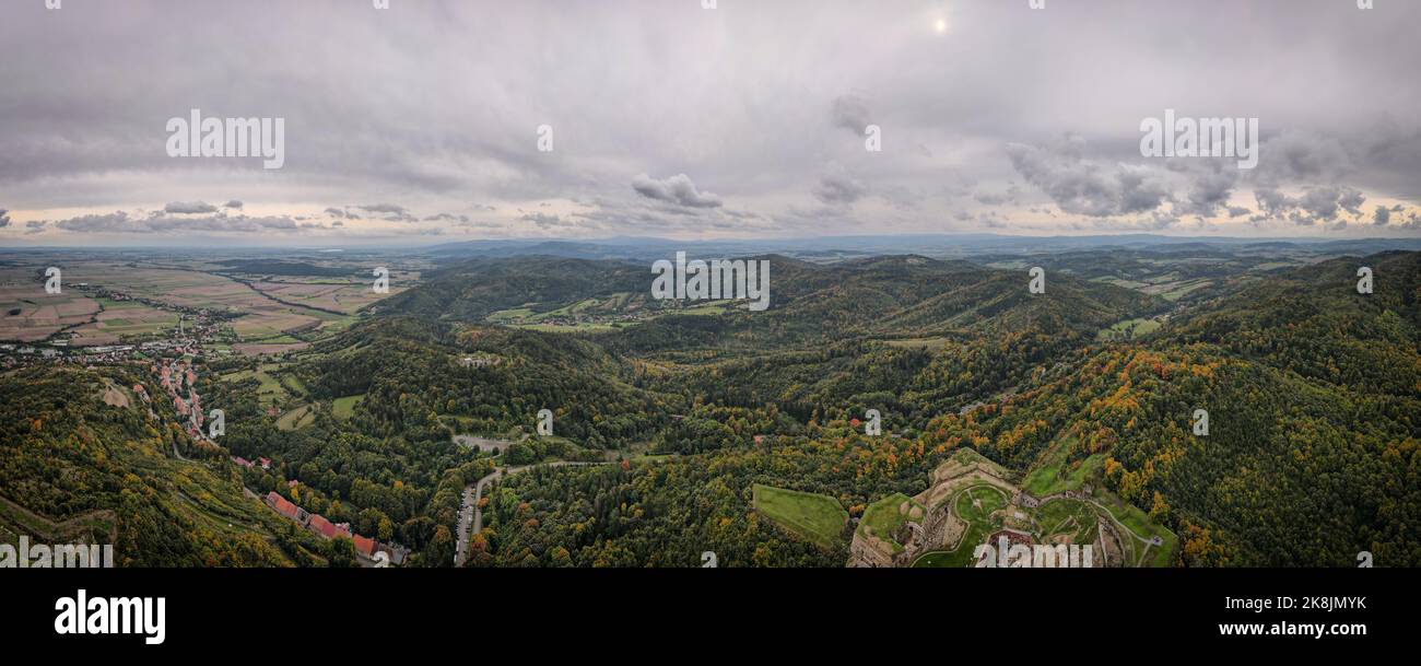 Drone flight over mountains covered with forest at autumn season ...
