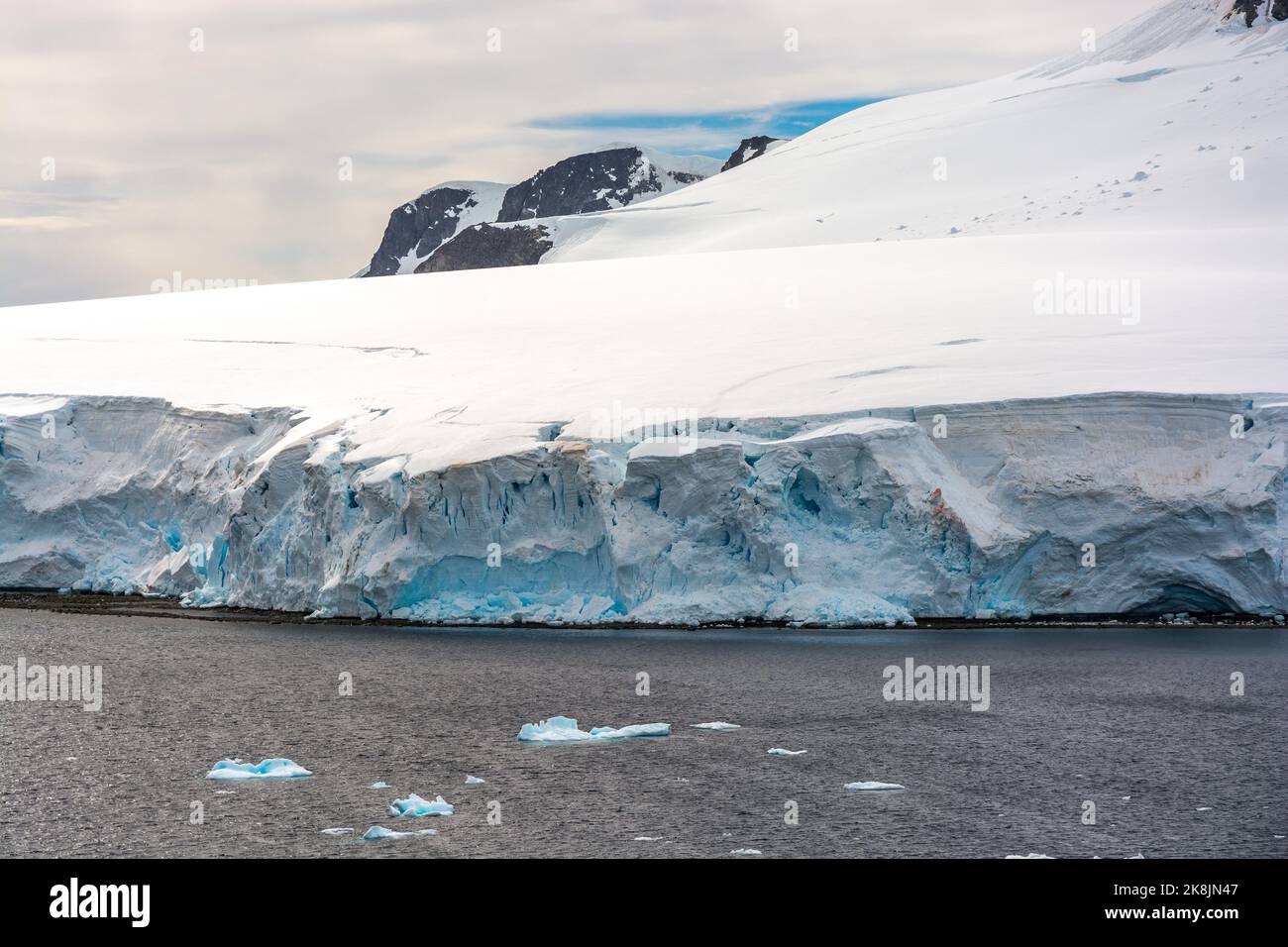 icy shoreline. paradise harbour (bay). west coast of graham land ...