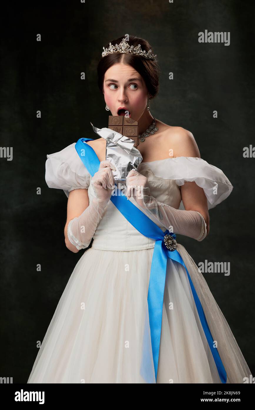 Sweet delight. Elegant woman, royal person, queen or princess in white ...