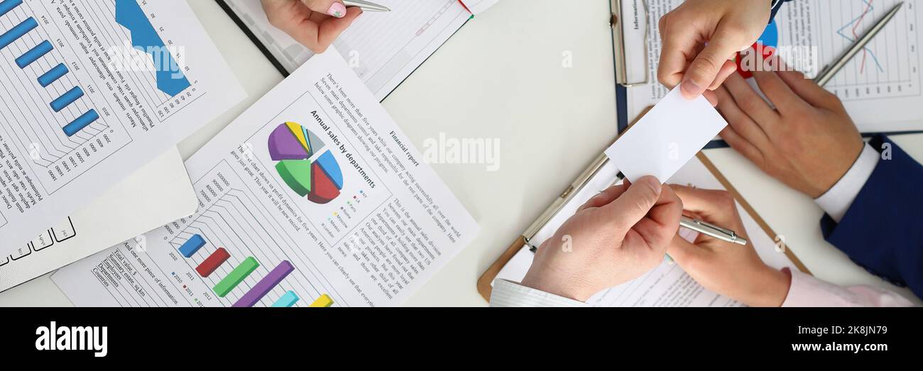 Team work on project together, mess with papers on workplace, social ...