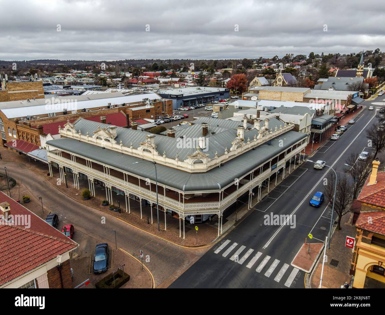 An aerial view of the town of Armidale with buildings and traffic on ...