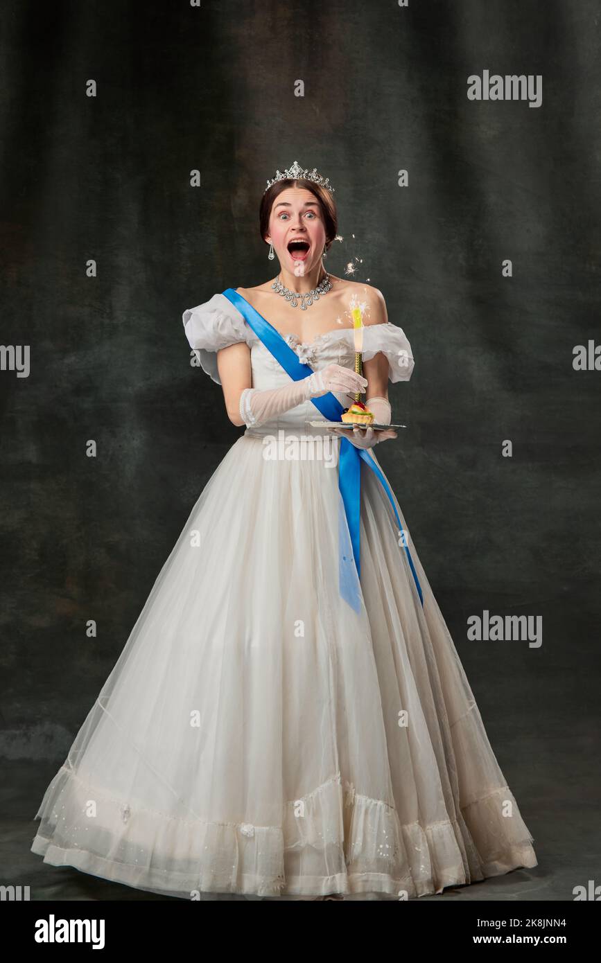 Happy birthday. Elegant woman, royal person, queen or princess in white ...