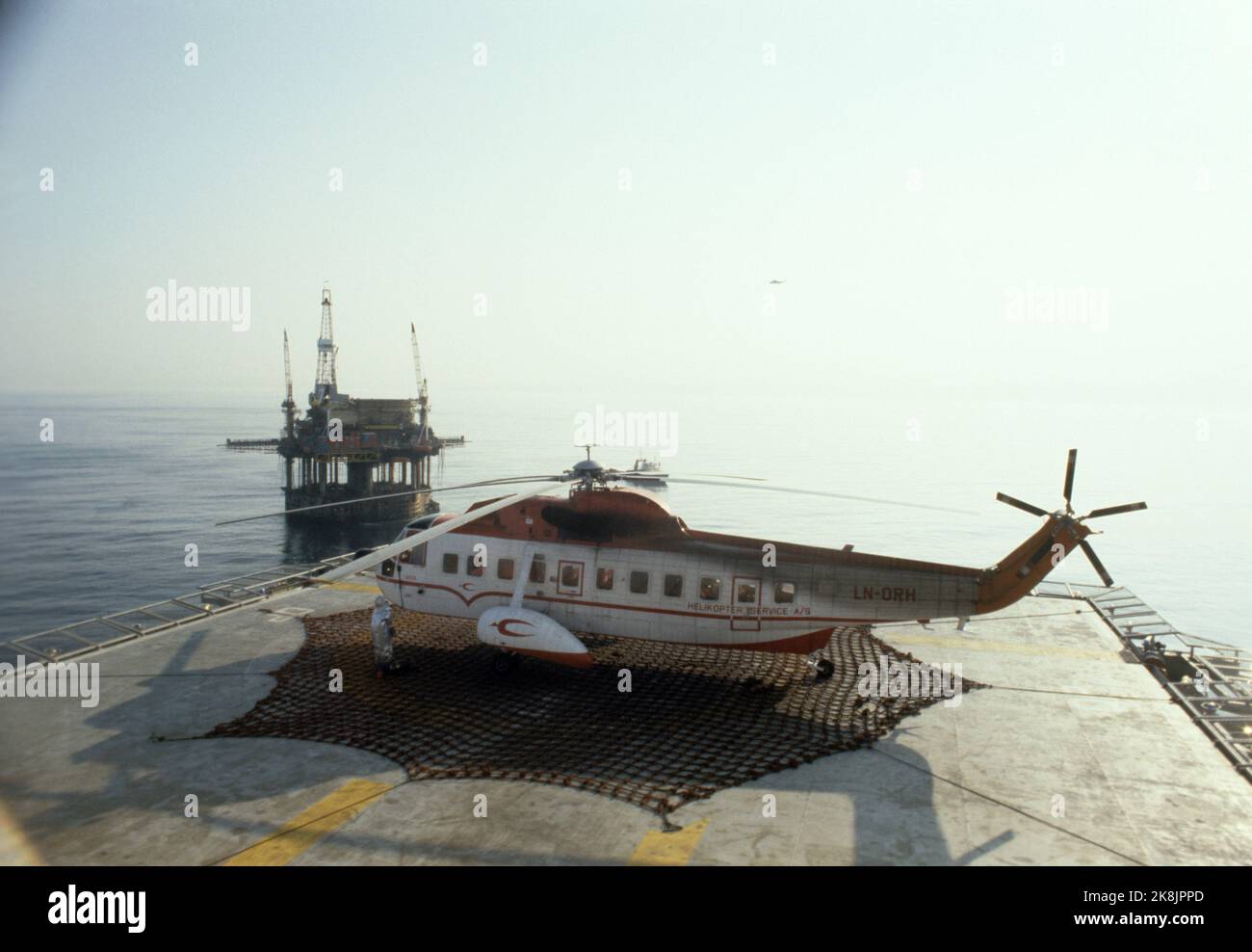 North Sea 19780508: The Frigg field. Oil fields. Helicopter lands on ...