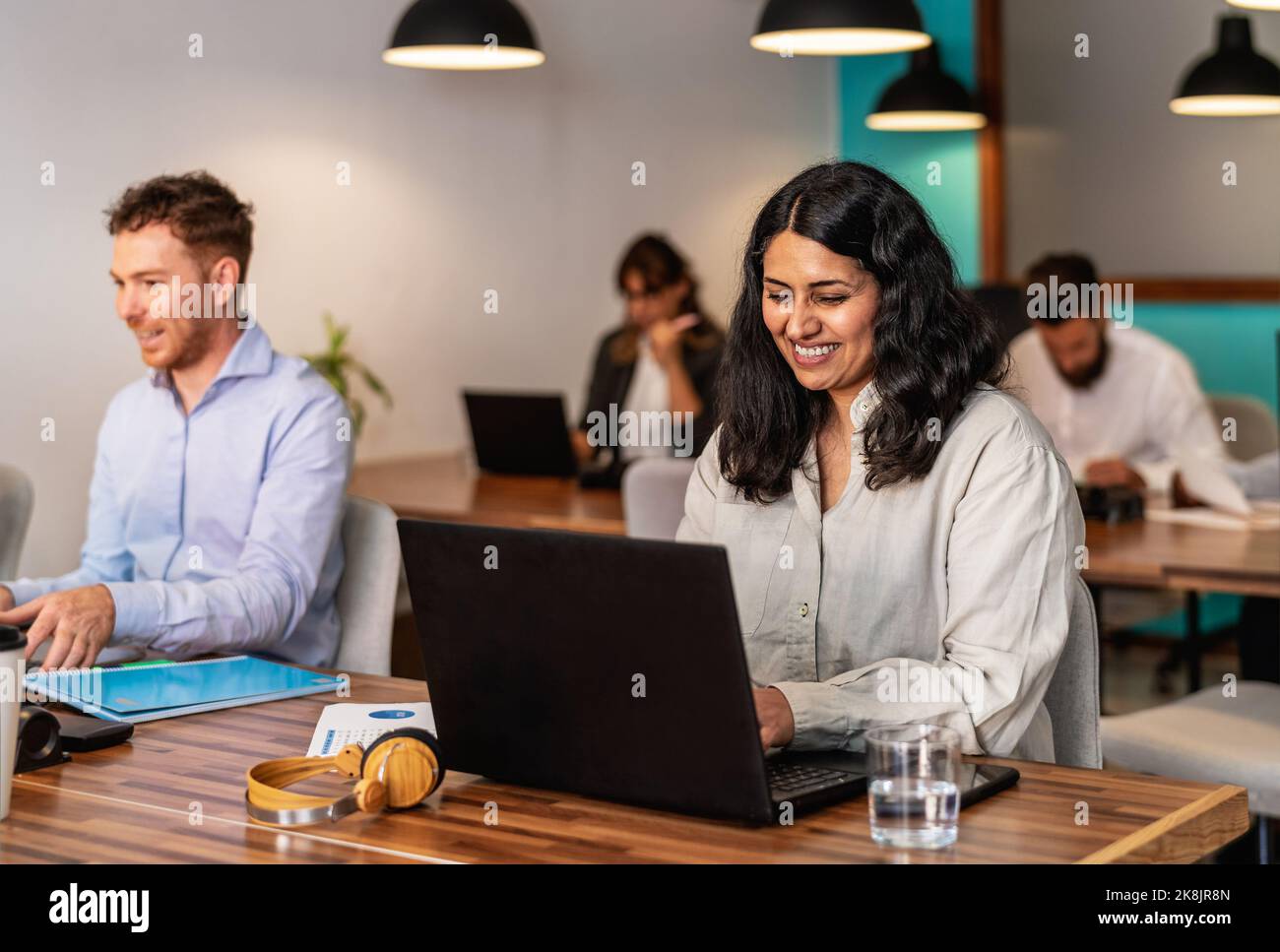 Multiracial people working inside coworking creative space Stock Photo ...