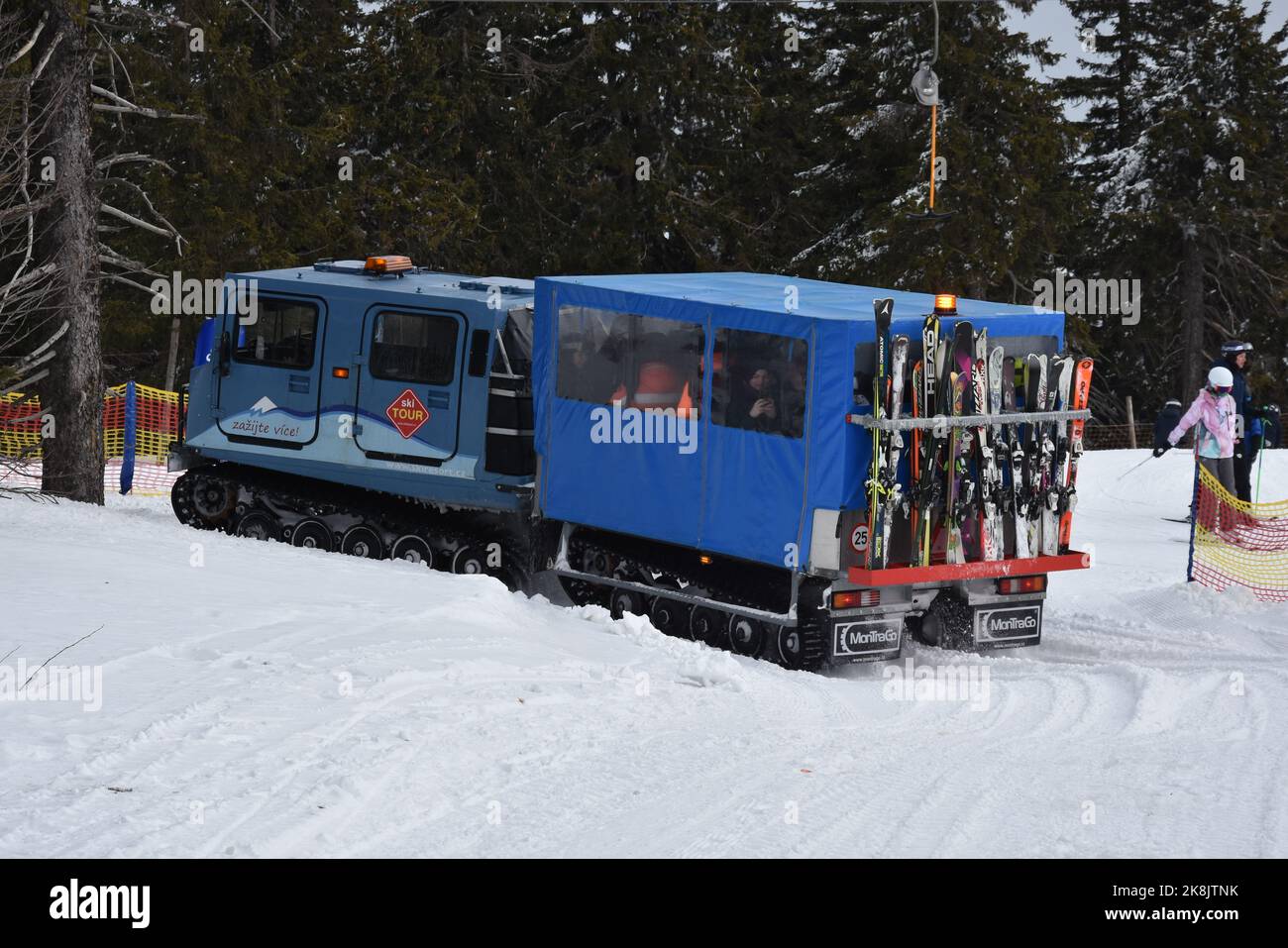 Transportation of skiers in the ski area on Cerna hora in the Giant ...