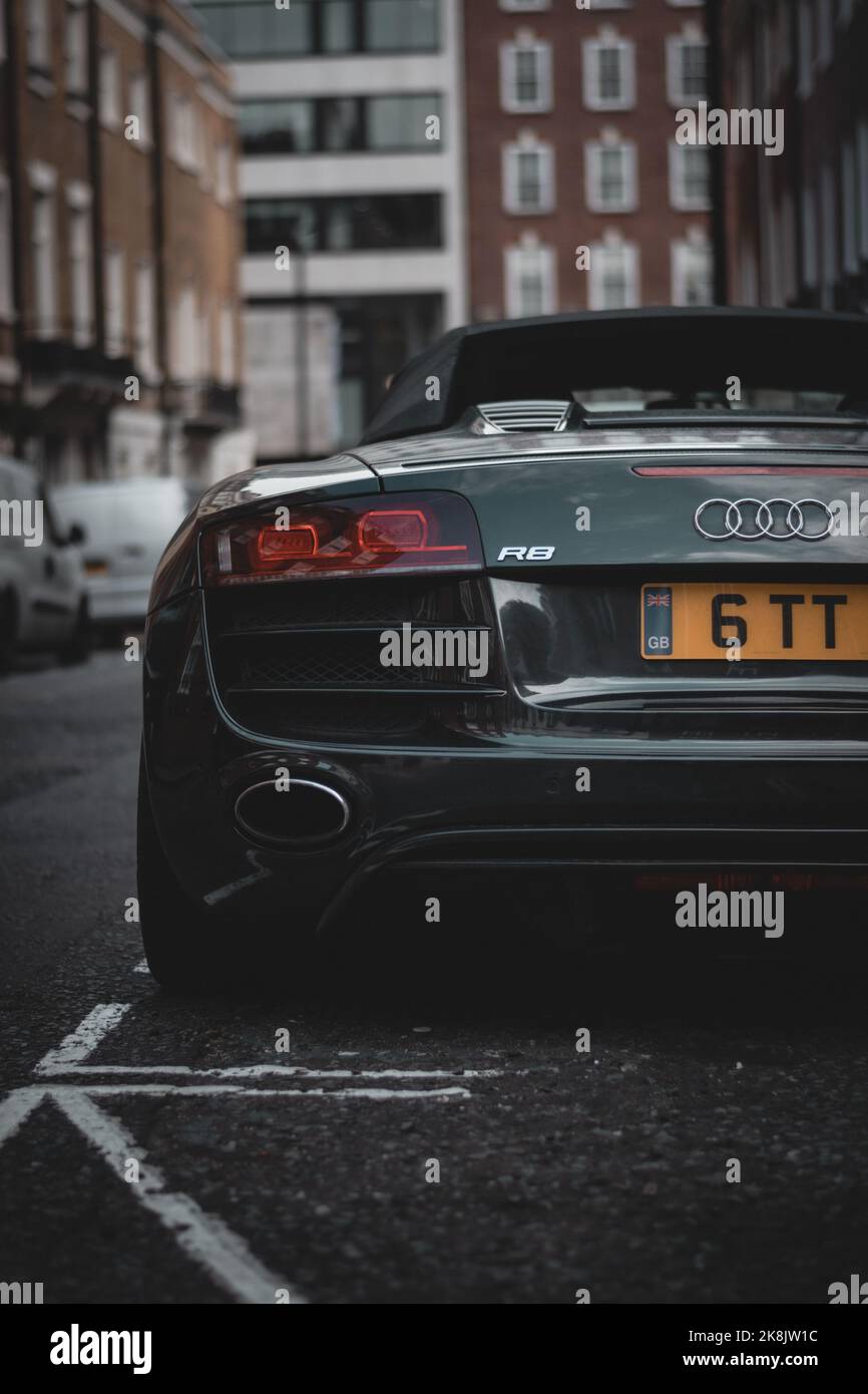 A vertical shot of an Audi R8 parked in the city of London Stock Photo ...