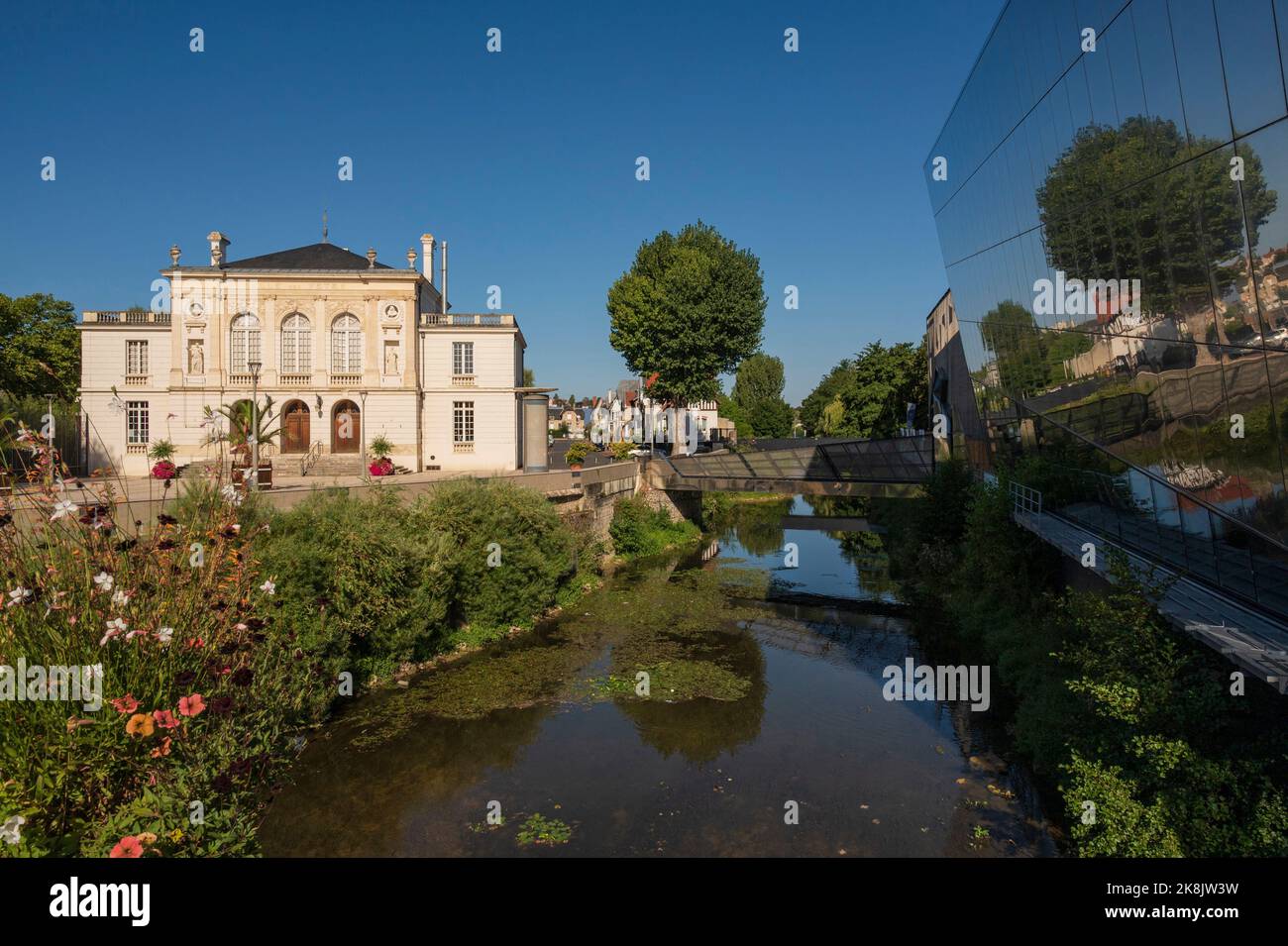 The modern public library (right) and the salle de fête (community ...