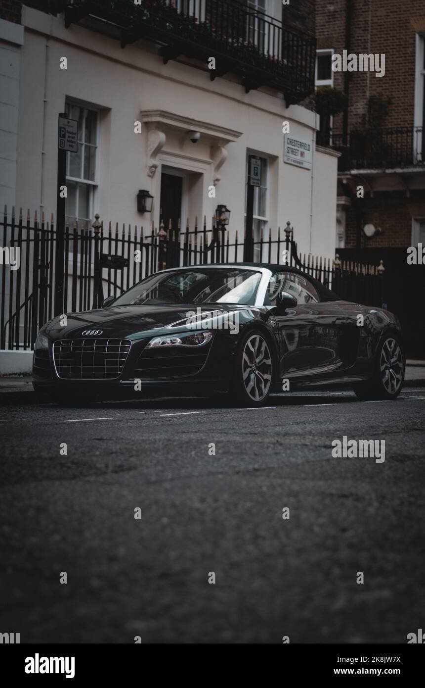 A vertical shot of an Audi R8 parked in the city of London Stock Photo ...