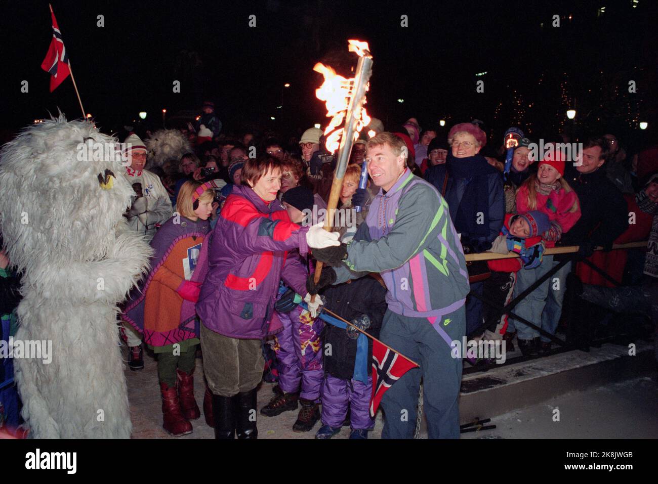 Oslo 19940205 Mayor Ann-Marit Sæbønes hands over the Olympic fire from ...