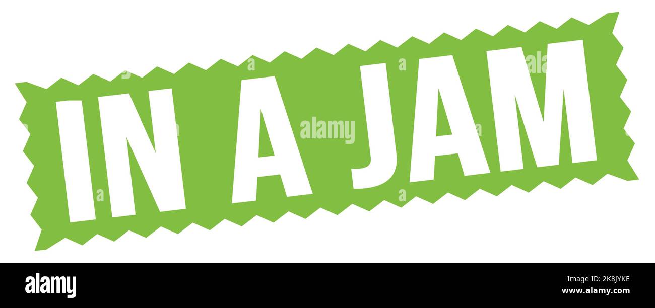 IN A JAM text written on green zig-zag stamp sign Stock Photo - Alamy