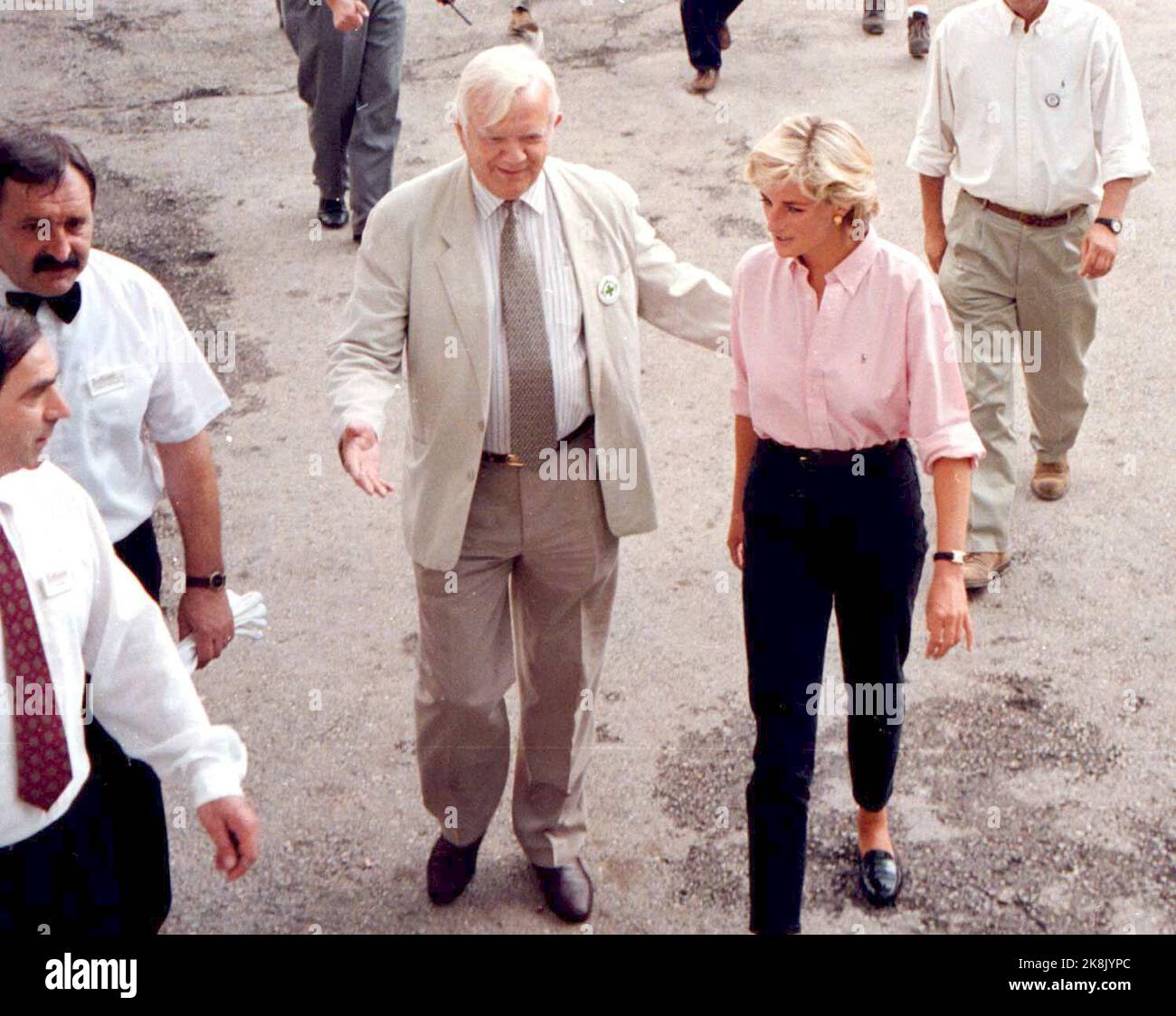 Princess Diana is followed to a meeting with Norwegian People's Aid by ...