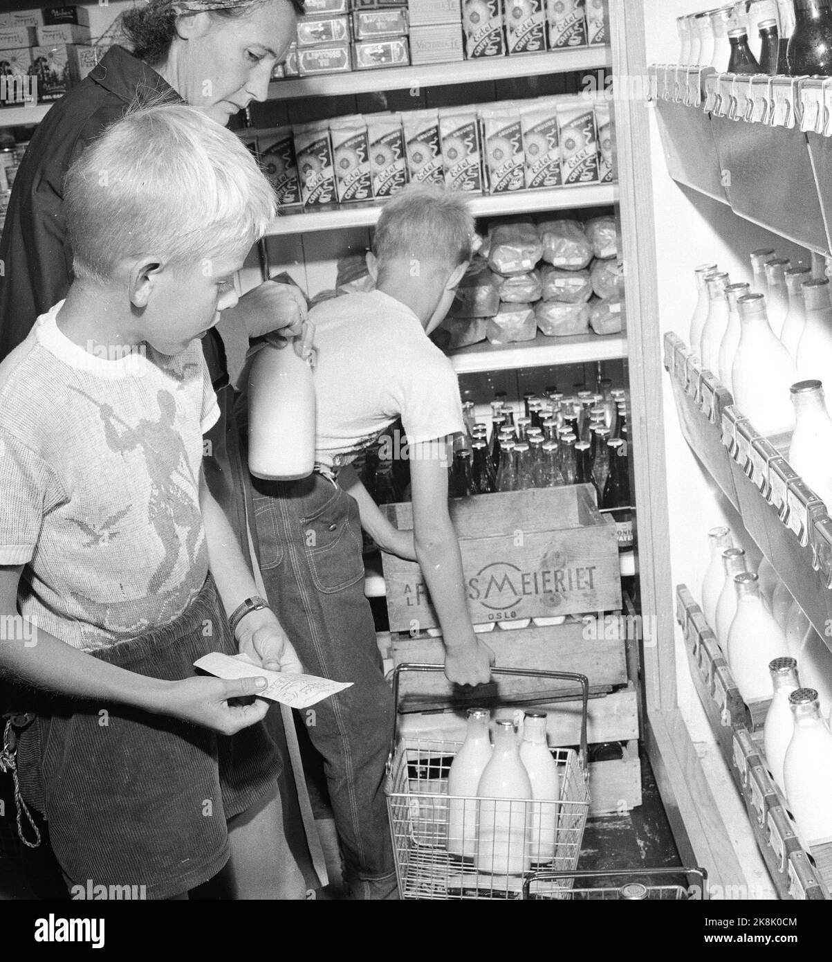 19550917 The milk our problem child Milk shortage in Oslo. People are ...