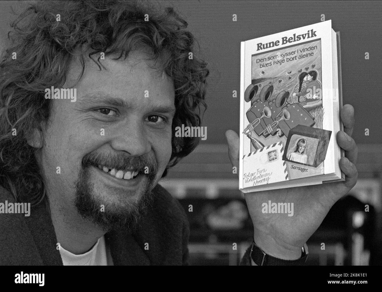 Oslo 19870423. Author Rune Belsvik with the book "The one who kisses in ...
