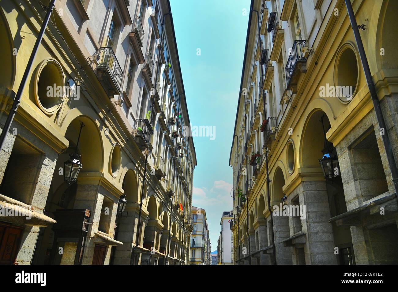 A view of baroque style downtown ancient buildings and arcades in Turin ...