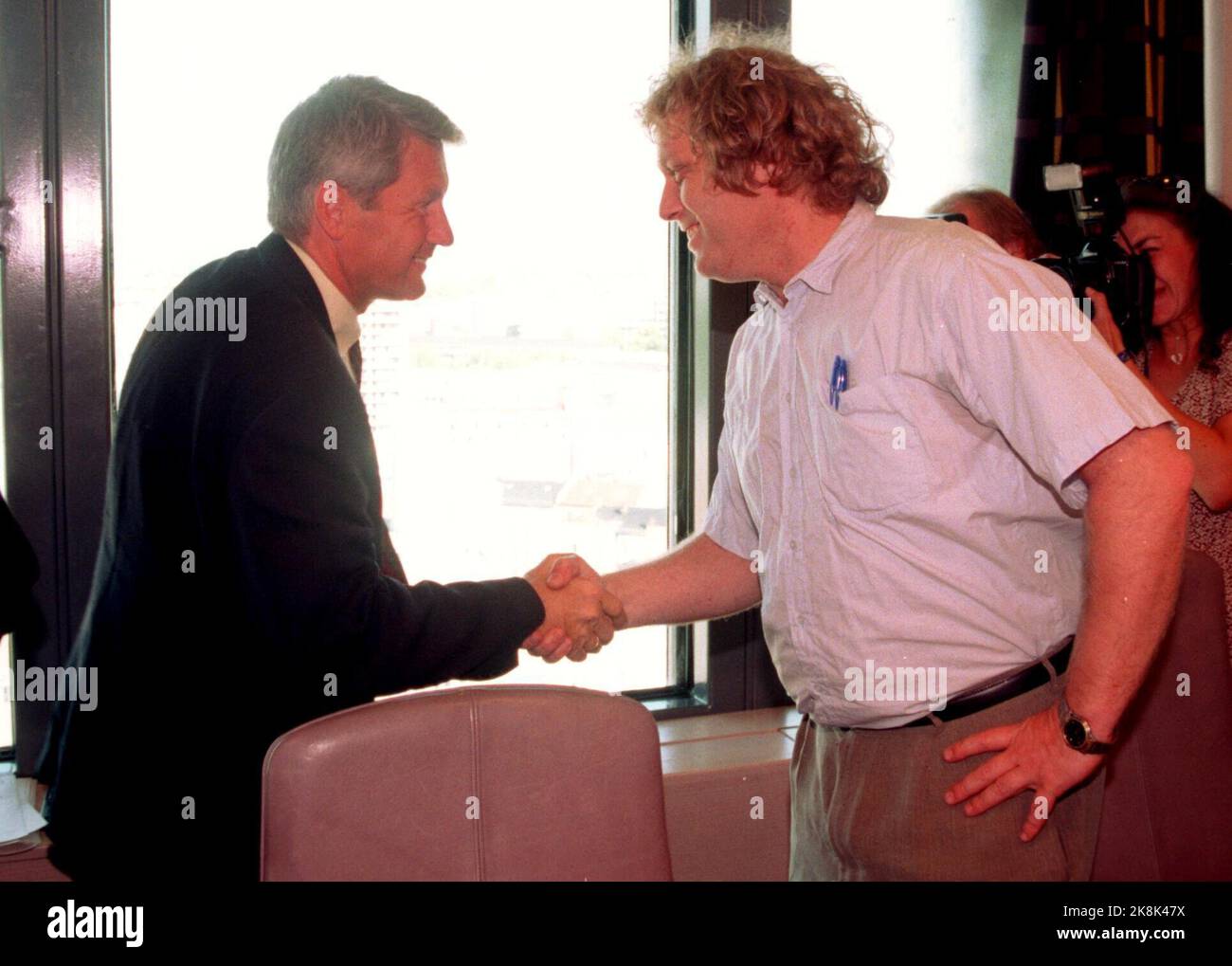 Cornelius poppe happiness handshake hi-res stock photography and images ...