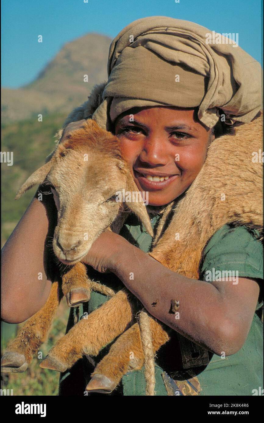 Ethiopia, Tigray - Shepherdboy with a lamb Stock Photo - Alamy