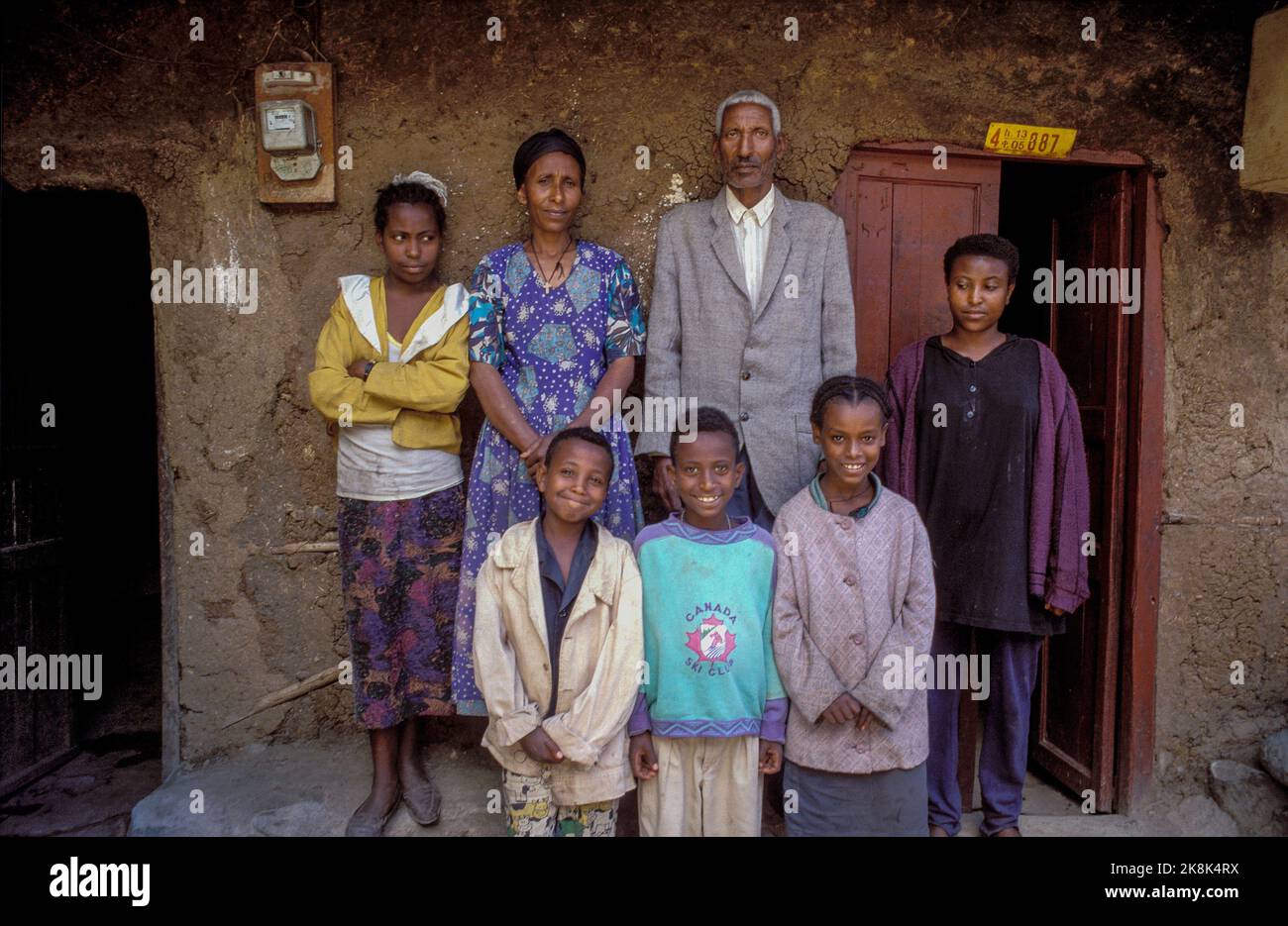 Ethiopia, Addis Abeba; Portrait of a family in front of their house ...