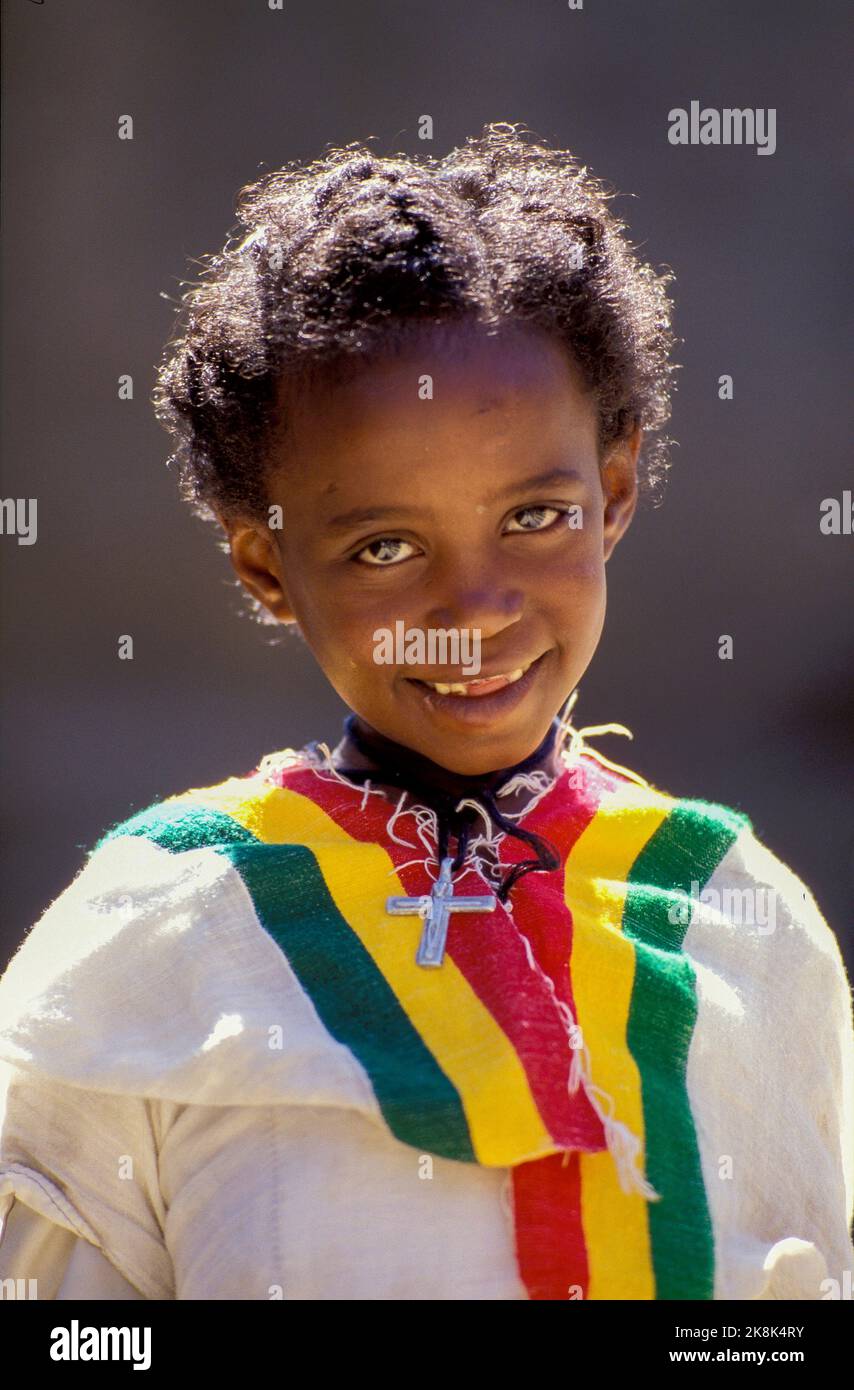 Ethiopia, Tigray; Portrait of a rastafari coptic child, dressed in ...