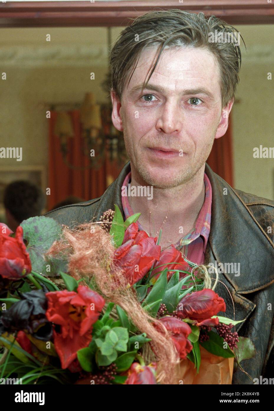 Oslo 19950302. Author Torgeir Schjerven with flowers after receiving ...