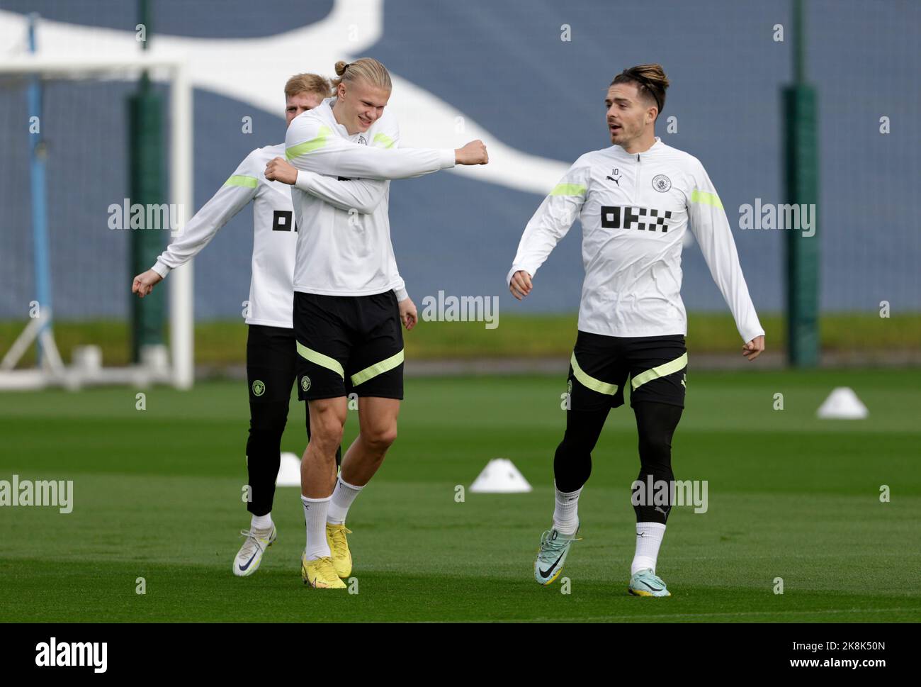 Manchester City's Erling Haaland (left) and Jack Grealish during a ...