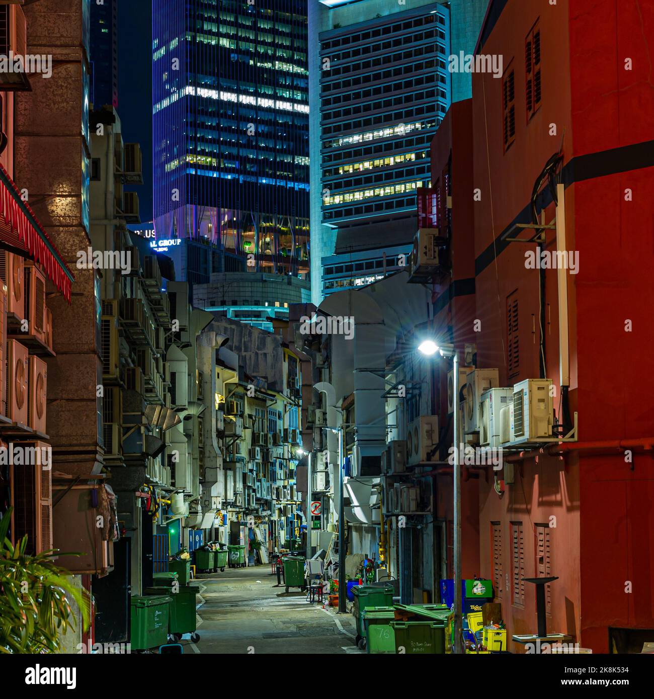A alley behind Boat Quay, Singapore. Back street,with skyscrapers in ...