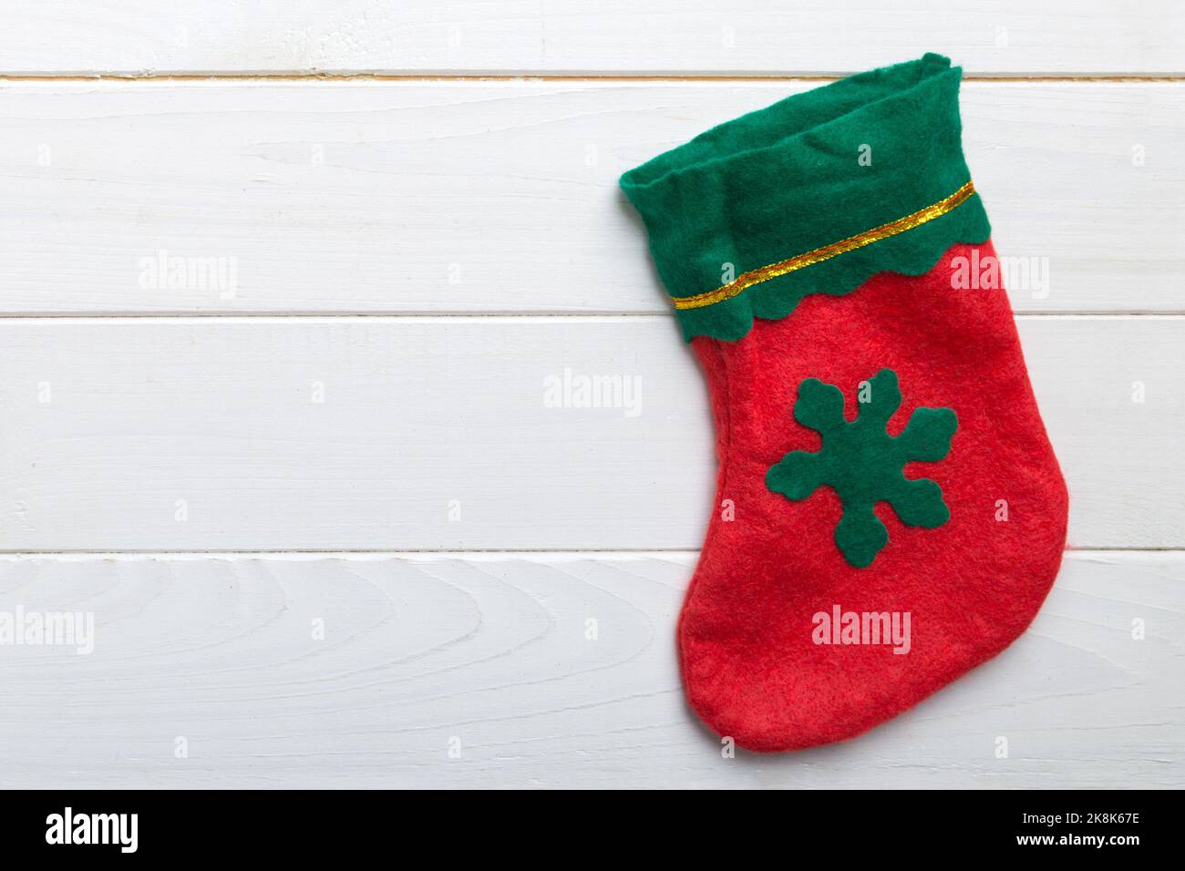 santa red sock top view on the color background with empty space ...