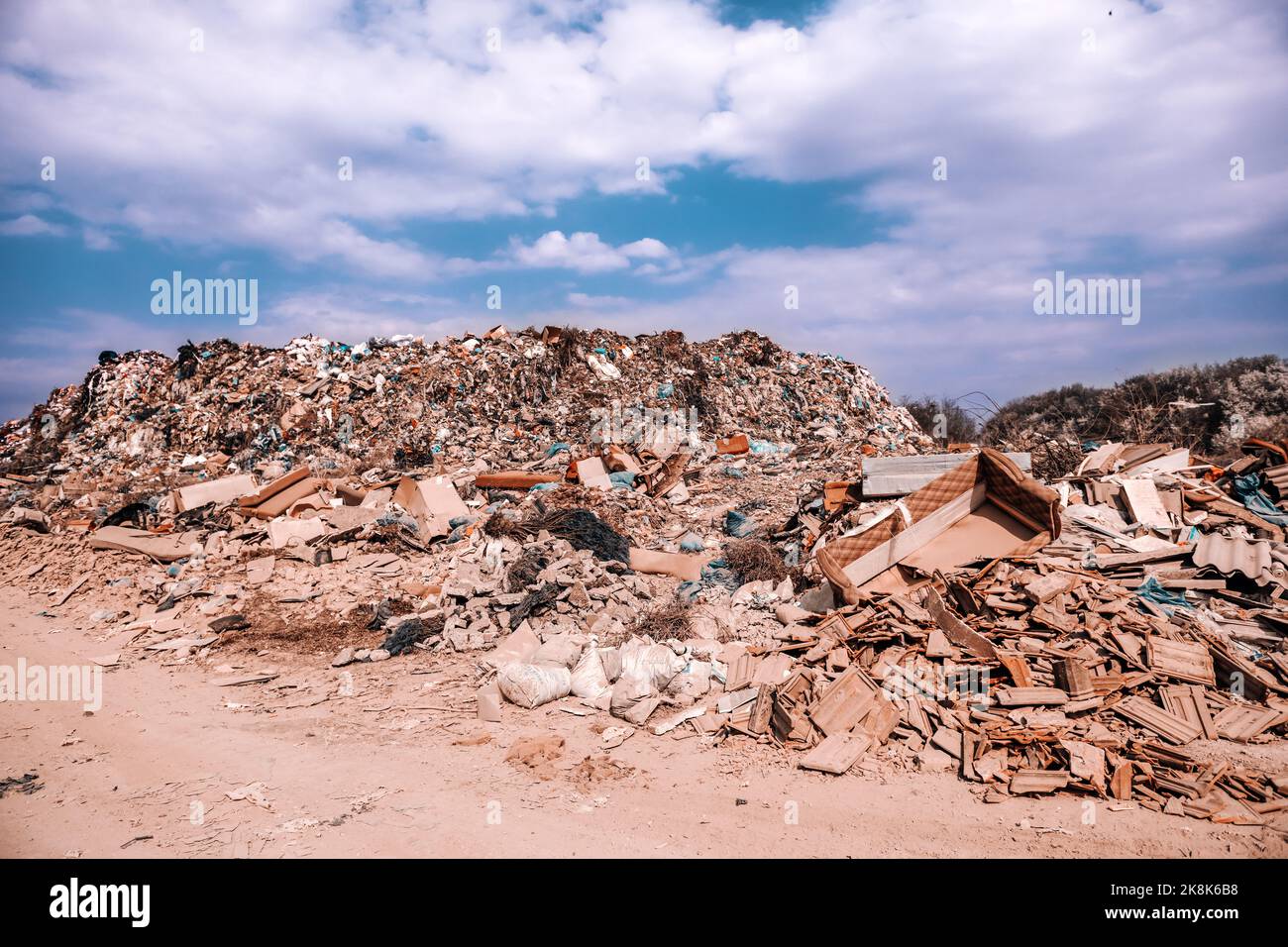 Proof of human negligence. On picture big pile of trash ruining nature ...