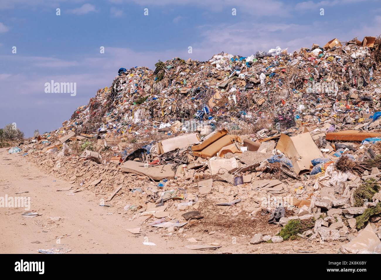 Proof of human negligence. On picture big pile of trash ruining nature ...