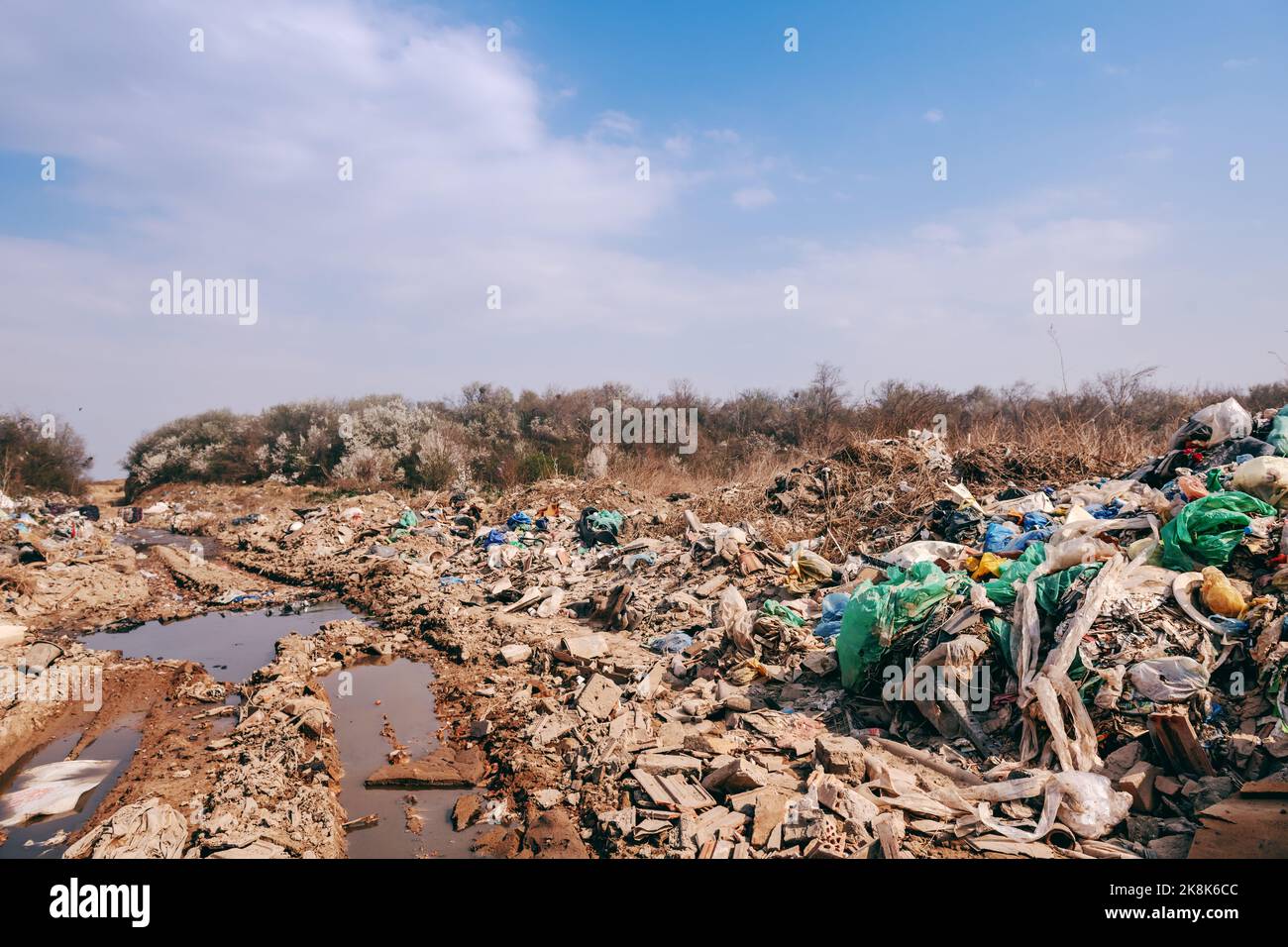 Proof of human negligence. On picture big pile of trash ruining nature ...