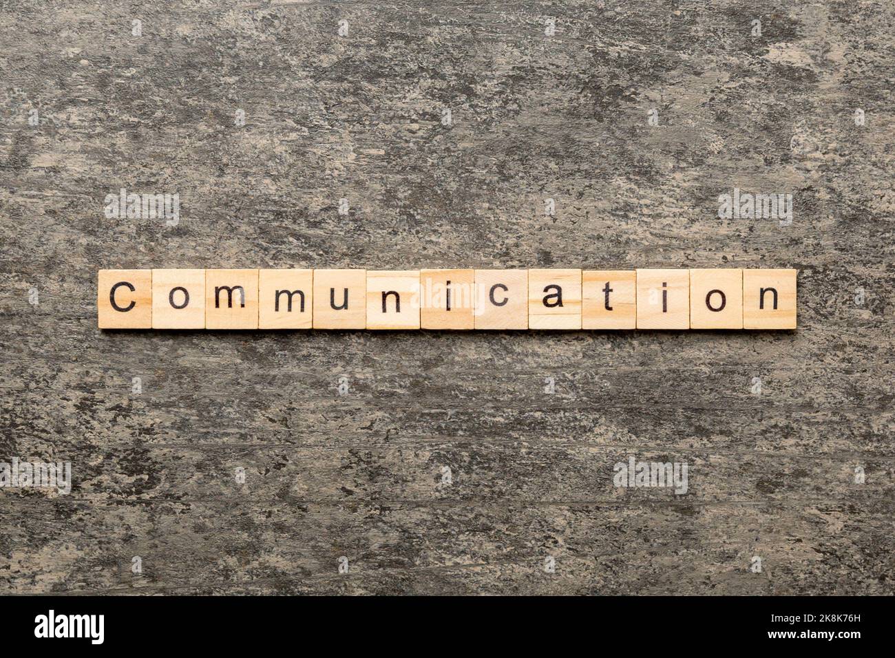 COMMUNICATION word written on wood block. COMMUNICATION text on cement ...