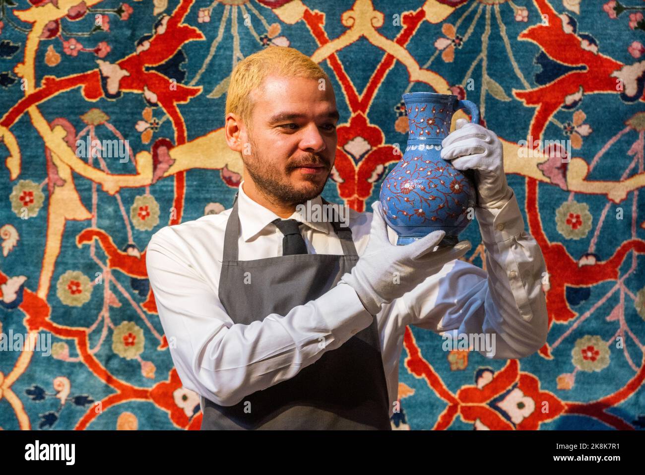London UK. 24 October 2022 . AN IZNIK SLIPWARE POTTERY JUG Ottoman ...
