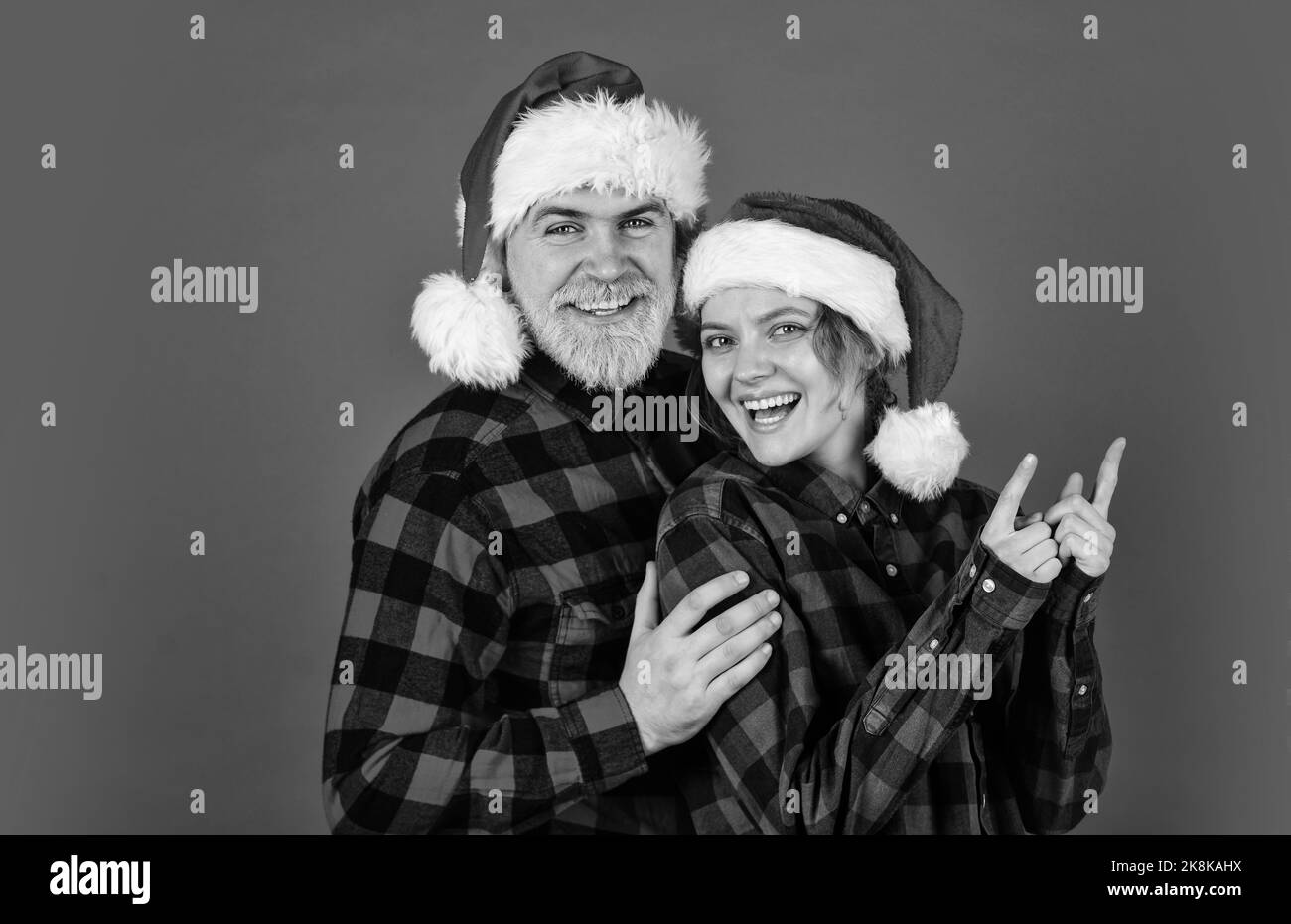 Family shopping. Christmas party. Couple in love cuddling. Good mood ...