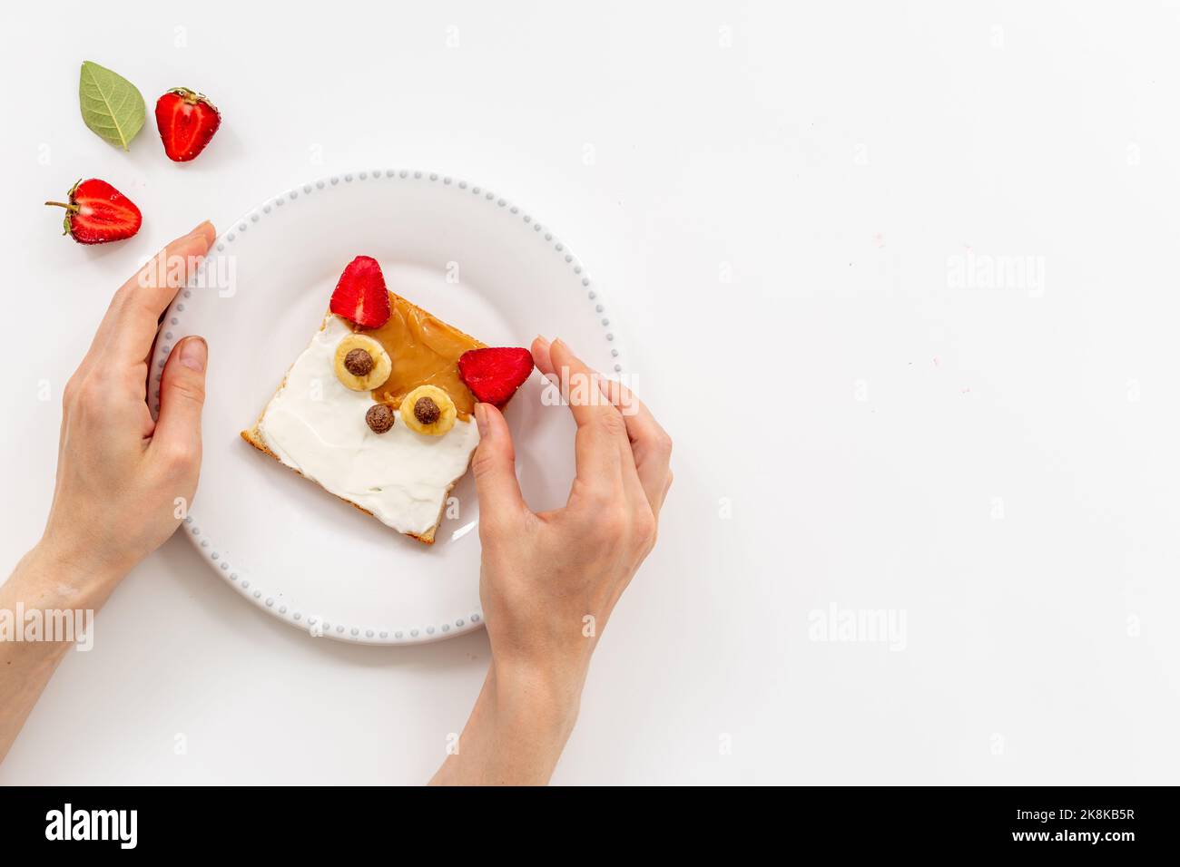 Kids breakfast with fox faces sandwiches made from peanut butter and ...