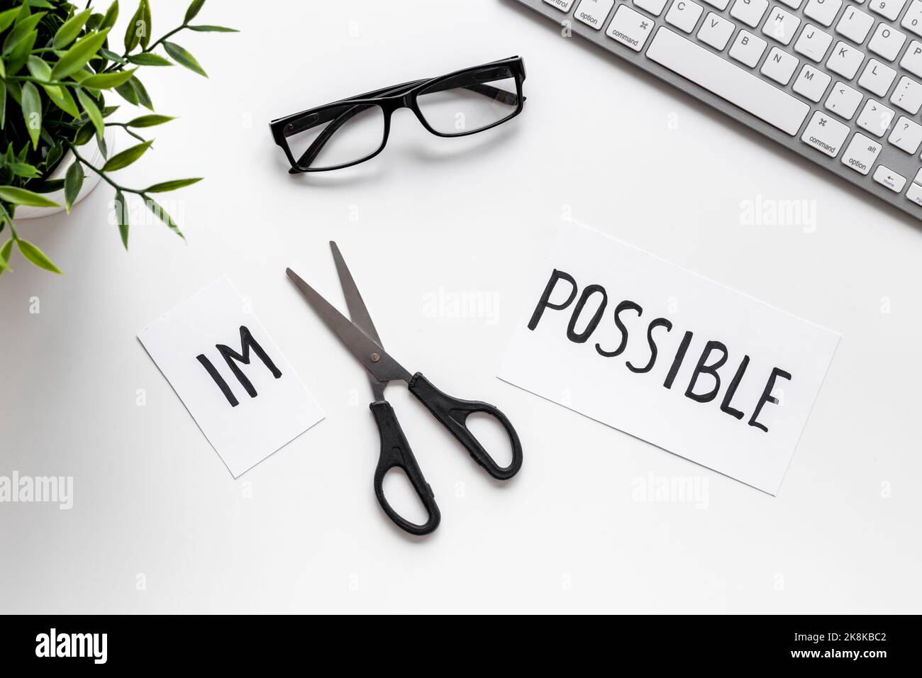 It is possible concept. Word Impossible becomes Possible with scissors ...